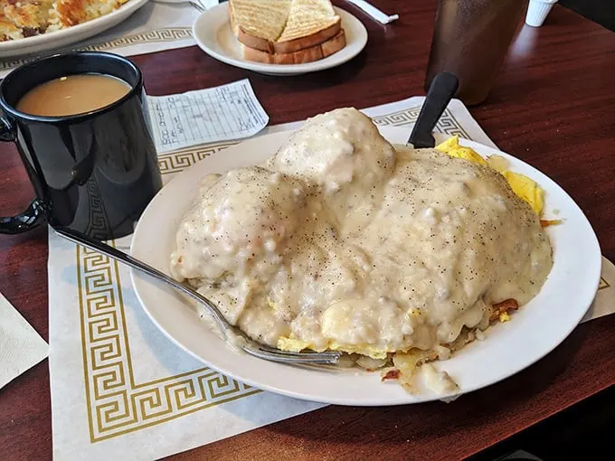 Flaky biscuits swimming in a sea of creamy gravy. It's not just comfort food, it's a warm, peppery blanket for your soul.