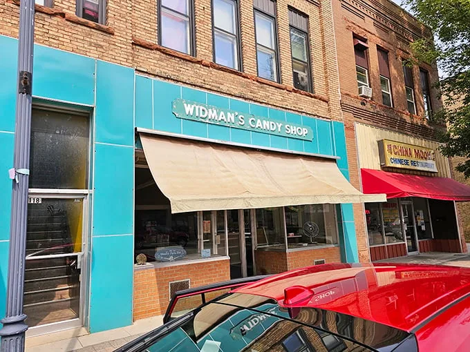 Mint green and full of dreams (and chocolate). The storefront is like the cool, calm prelude to a sugar-fueled symphony.