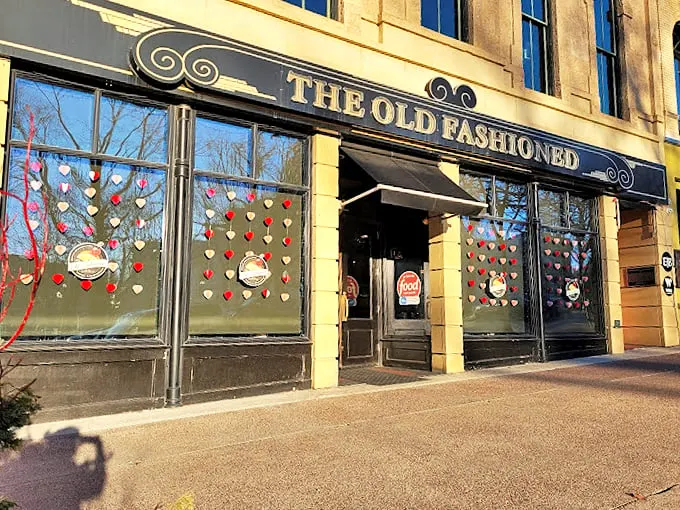Heart-warming welcome! The colorful window decorations are like a big, friendly "Come on in!" from your favorite Midwestern aunt.