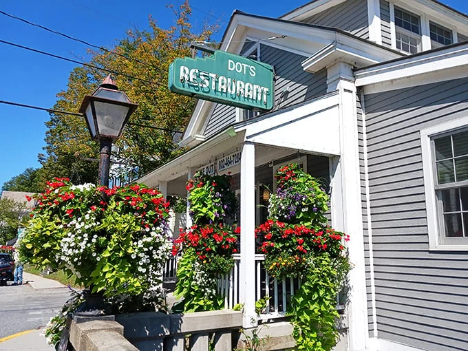 A floral explosion greets you at Dot's, where hanging baskets burst with color like nature's own fireworks display. Vermont charm, served fresh daily!