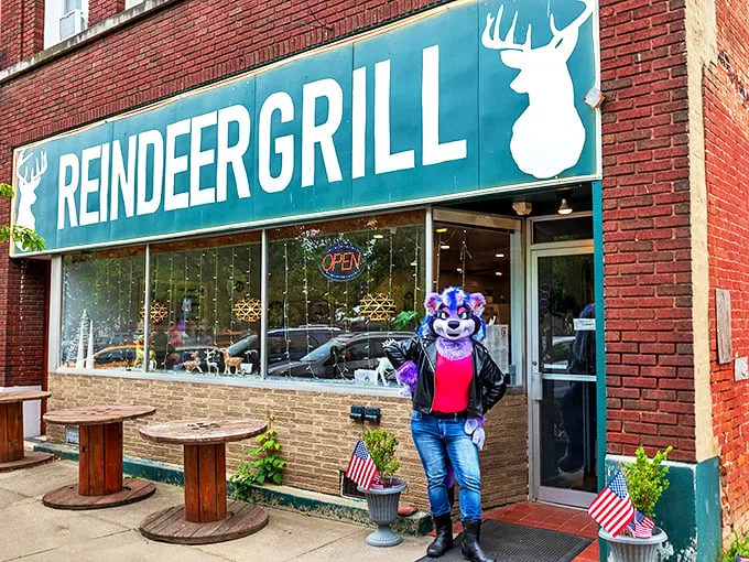 Who needs Rudolph when you've got a purple mascot? This teal-signed wonderland promises comfort food that'll make your taste buds do a happy dance.