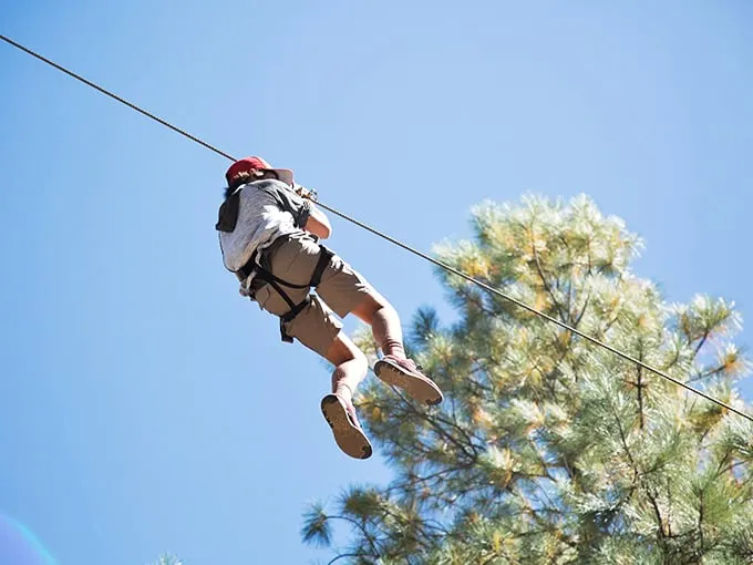 Defying gravity never looked so fun! This zip-liner is living out every kid's treehouse dream, minus the splinters and plus some serious altitude.