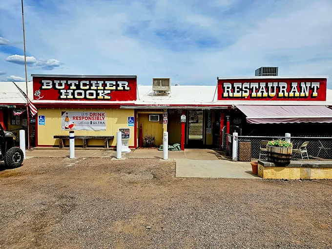 The Butcher Hook's bold red signage stands proud against Arizona's blue skies, like a beacon calling hungry travelers home.