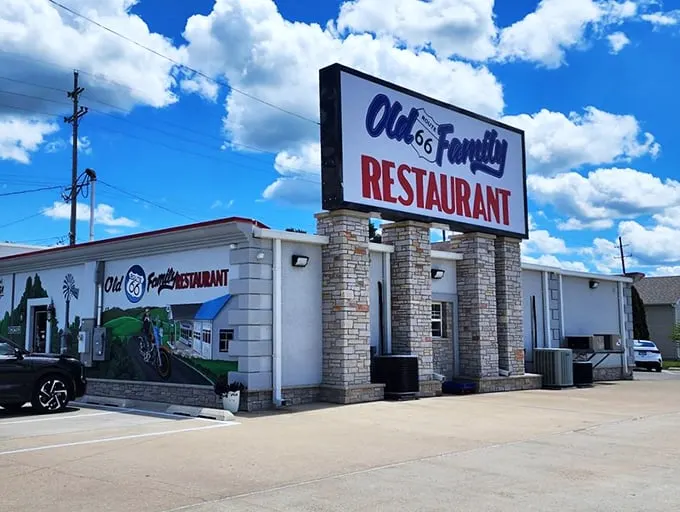 Like a beacon for hungry travelers, the stone pillars and classic signage promise comfort food with a side of nostalgia.