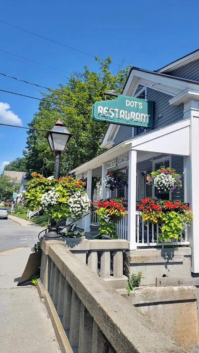 Welcome to Dot's, where charm blooms as abundantly as the flowers adorning its porch. This quaint eatery is Vermont's answer to Cheers – where everybody knows your name, and your favorite breakfast order.