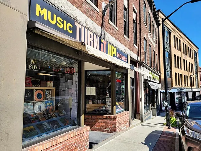 Step into a time machine disguised as a storefront! Turn It Up! beckons with its vibrant sign, promising a musical journey through the ages.