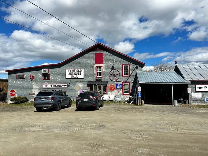 The unassuming exterior of Fairfield Antiques Mall beckons like a treasure chest disguised as a barn. Those red trim windows have seen some stories! Photo credit: Fairfield Antique Mall