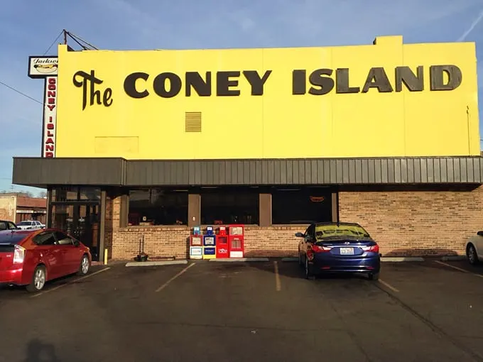 A beacon of breakfast bliss! This sunny yellow building isn't just a hot dog haven—it's a morning meal mecca waiting to be discovered.