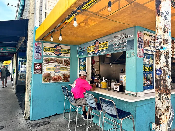 A slice of paradise, served with a side of humor! The Conch Shack's vibrant exterior promises a feast for both your eyes and taste buds.
