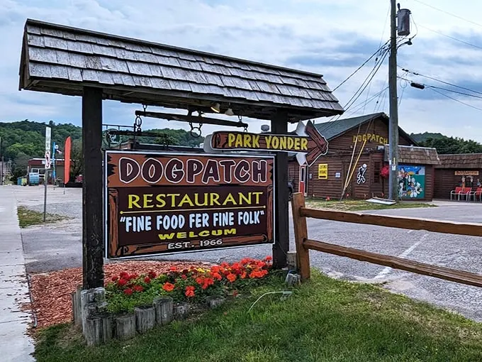 Where Li'l Abner meets Lake Superior charm—this rustic welcome sign promises "Fine Food Fer Fine Folk" and delivers on every word.