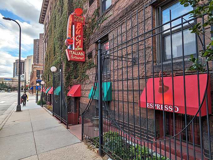 Mama mia! This brick facade isn't just a wall – it's a portal to pasta paradise. Red awnings and ivy whisper promises of cozy Italian feasts within.