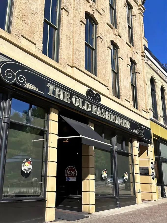 A beacon of nostalgia! The Old Fashioned's classic facade promises a journey back in time, with a side of Wisconsin charm.