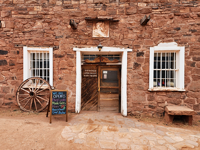 Step right up to the time machine! This weathered entrance isn't just a door—it's a portal to the Wild West, complete with wagon wheel greeter.