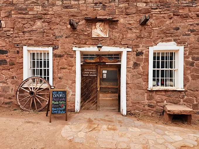 Step right up to the time machine! This weathered entrance isn't just a door—it's a portal to the Wild West, complete with wagon wheel greeter.