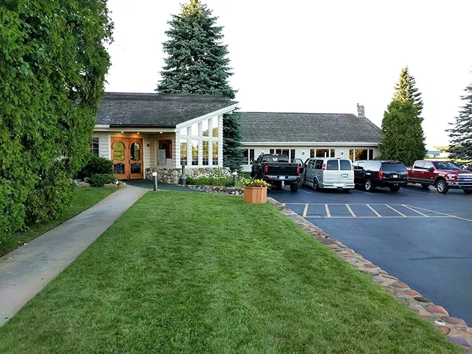 Welcome to Boone's Long Lake Inn, where rustic charm meets culinary delight. This cozy log cabin-style restaurant looks like it could be the set for a Hallmark Christmas movie—but trust me, the food is the real star here.