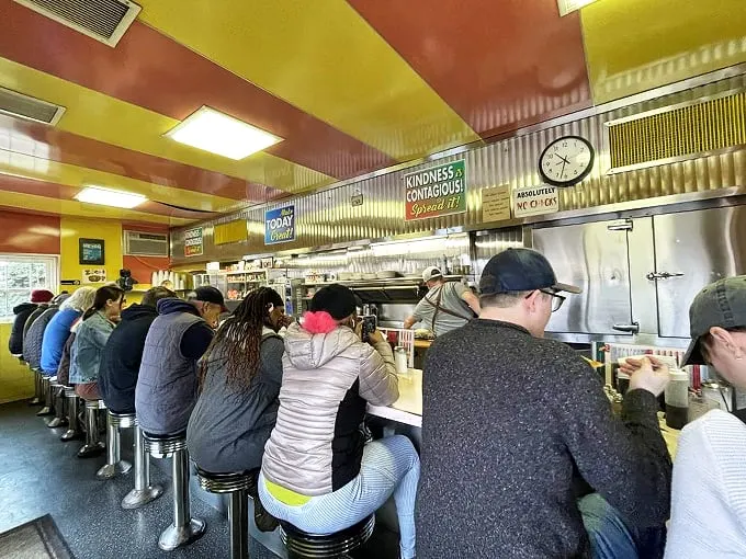 Where everybody knows your name... and your usual order. This isn't just a diner, it's a community hub with a side of hash browns.