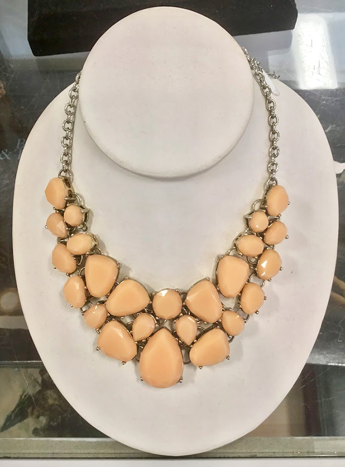 Statement piece alert! This necklace isn't just an accessory – it's a conversation starter that whispers, "I've got great taste and savvy shopping skills."