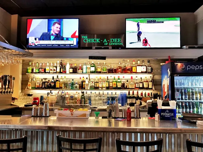 Bottoms up at the Chick-A-Dee bar! Where the drinks are cold, the conversation is warm, and the seafood is always the catch of the day.