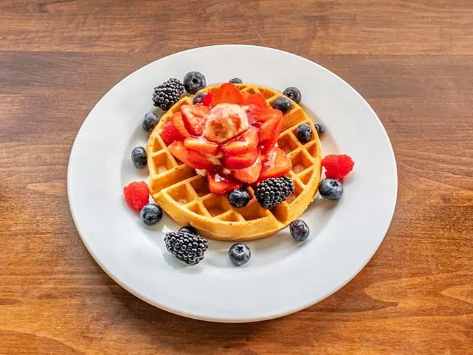 A waffle that's not waffling about its berry enthusiasm. It's fruit-forward and fabulous!