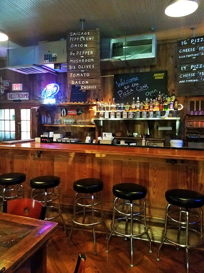 Pizza, please! This cozy bar area proves that sometimes the best things in life come with extra cheese and a cold brew.