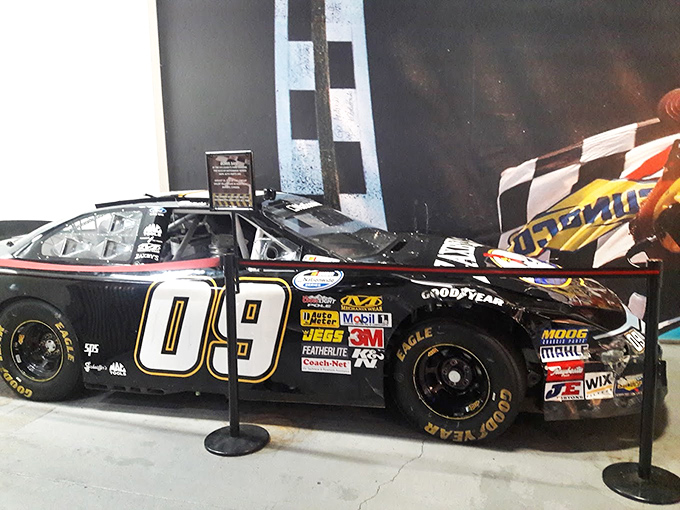 A slice of NASCAR heaven! This full-size race car display brings the big leagues to your fingertips.