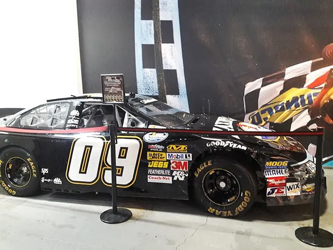 A slice of NASCAR heaven! This full-size race car display brings the big leagues to your fingertips.