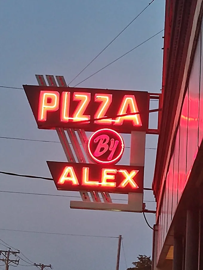Forget the North Star - this neon beacon guides hungry souls to their cheesy destiny.