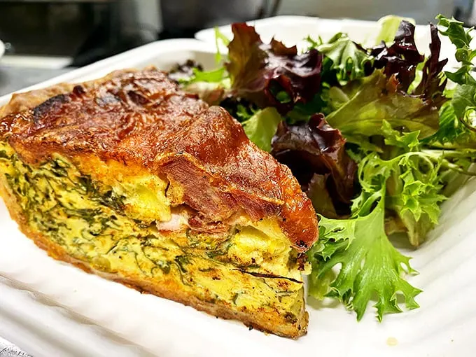 A quiche that's cheesier than your dad's best jokes. It's a slice of happiness that'll make your day!