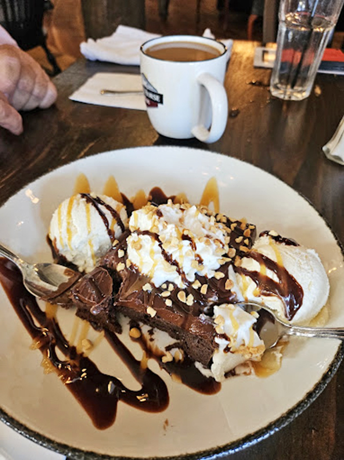 Chocolate decadence that would make Willy Wonka jealous. This dessert isn't just served, it's presented—like edible modern art.