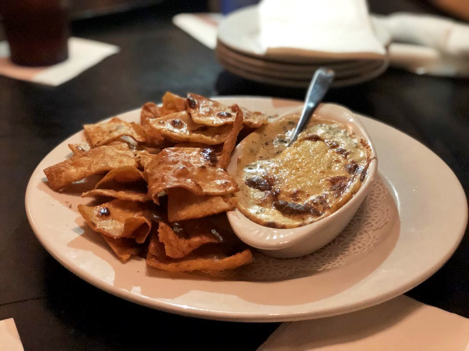 Spinach dip that Popeye would approve of. Creamy, cheesy, and served with crispy chips – it's the perfect start to your Irish culinary adventure. Photo credit: Bobby B.