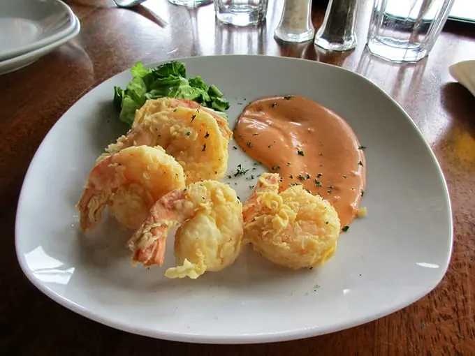 Coconut shrimp that's crispy on the outside, tender inside, served with a sauce that'll make you forget about cocktail sauce. Photo credit: Cory M.