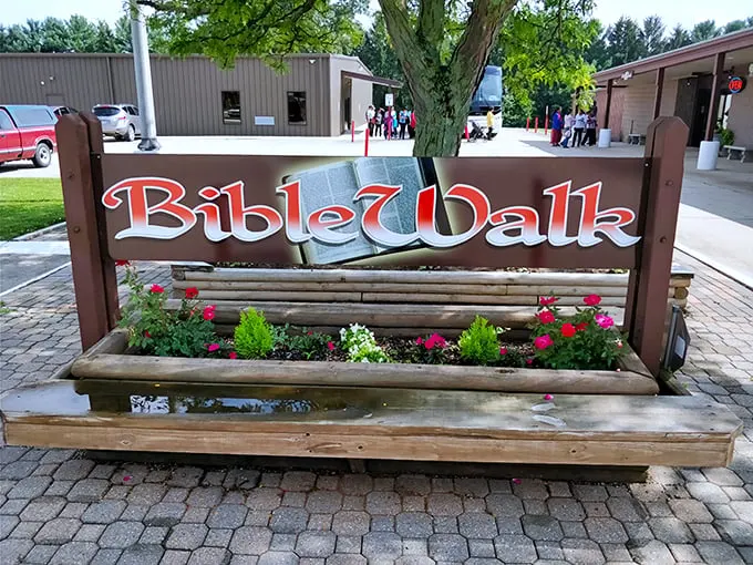 BibleWalk: Where faith meets flowers! This charming sign welcomes visitors to an experience that's part spiritual journey, part horticultural delight.