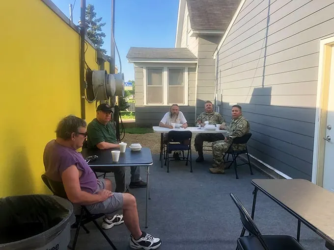 Al fresco feast! Who needs fancy patio furniture when you've got good company and great food under the Minnesota sky?