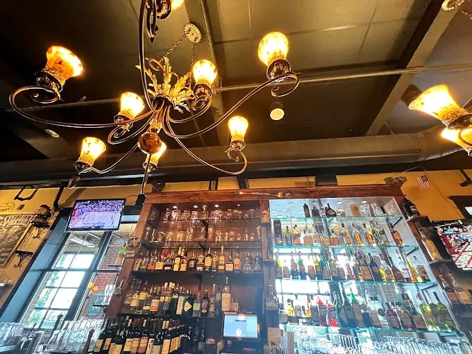 Bottoms up at Cafe Santé's bar! With a selection this good, you might find yourself channeling your inner sommelier or mixologist. Cheers!