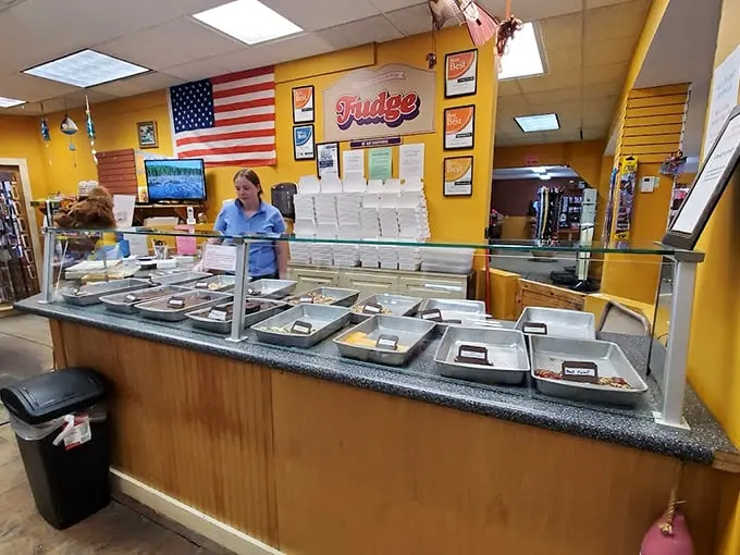 Behind the counter, a friendly face tends to trays of fresh fudge, each variety more tempting than the last.