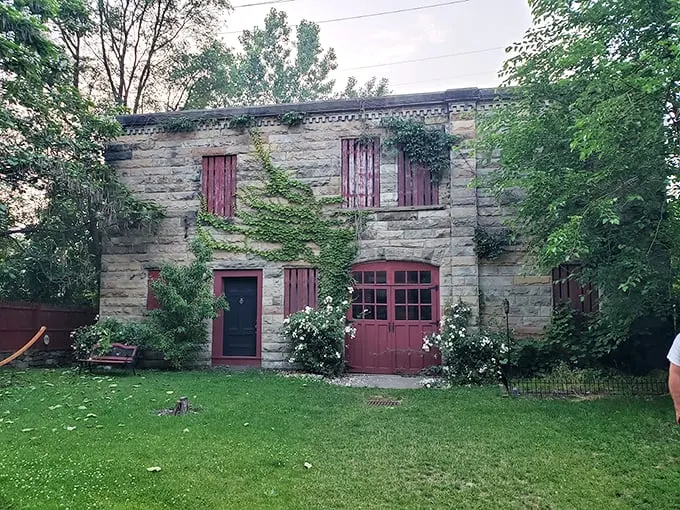 Nature's taking over! This stone fortress looks like it's auditioning for a starring role in "The Secret Garden: Spooky Edition."