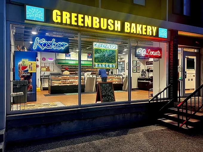 Neon dreams and sweet screams! This kosher bakery's glow could guide ships to shore – if ships were searching for the perfect donut.