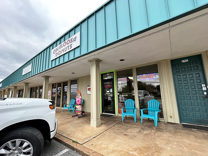 Okaloosa Yummies: Where donuts go to fulfill their glazed ambitions. Turquoise exterior, blue chairs, and a promise of sugary bliss – it's Florida's sweetest pit stop!
