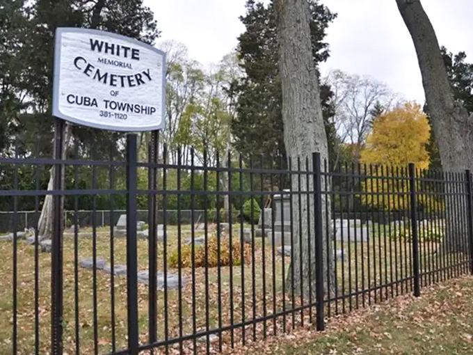 Welcome to the iron-gated time capsule! This cemetery's weathered headstones tell tales older than your grandma's secret recipe. Photo credit: 365 Barrington