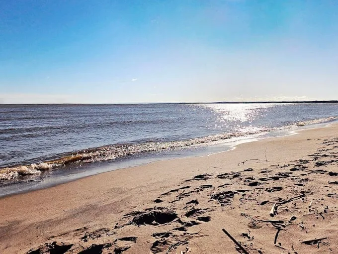Where beach dreams come true! Soft sand, clear waters, and a lighthouse view – Ohio's answer to the Riviera. Photo credit: Michelle