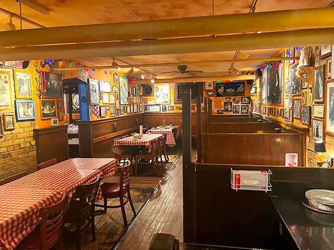 Step inside and embrace the organized chaos! Every inch tells a story, from checkered tablecloths to walls plastered with memories. It's like your Italian nonna's basement, but with better lighting.