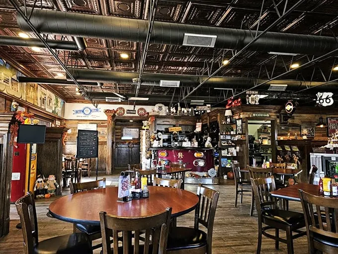Ornate tin ceilings meet rustic wood paneling, creating the perfect backdrop for Route 66 memories and morning coffee.