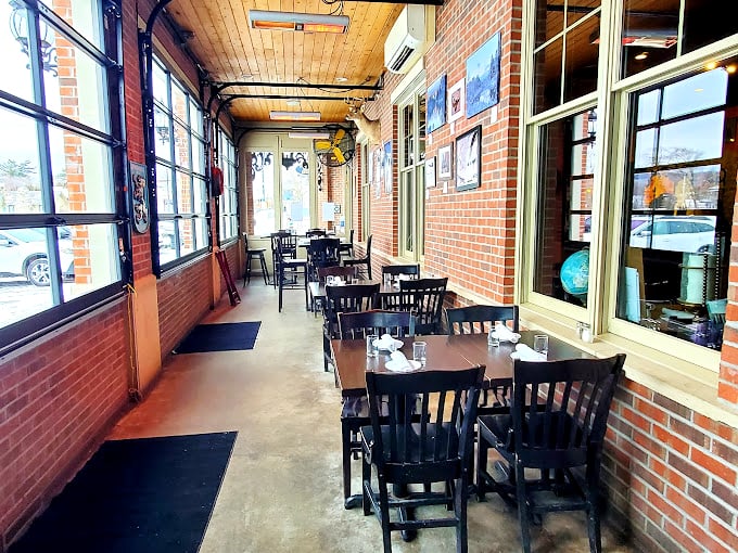 Cozy up in Cafe Santé's dining room, where the ambiance is warmer than a French grandmother's embrace. It's where comfort meets culinary adventure!