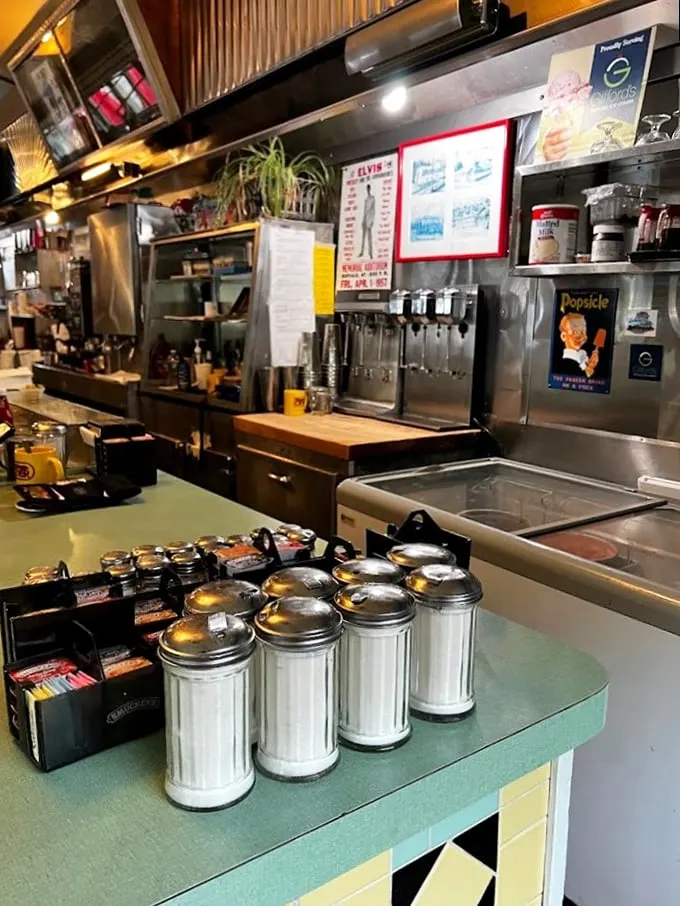 Sugar shakers stand at attention, ready for their sweet duty. It's like a miniature skyline of deliciousness!