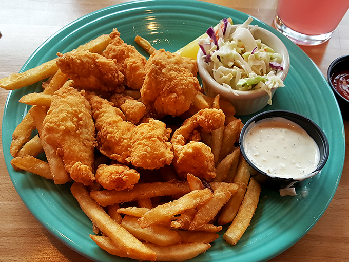 Golden, crispy, and more comforting than a warm lighthouse on a foggy night. This plate of fish and chips is the catch of the day, every day.