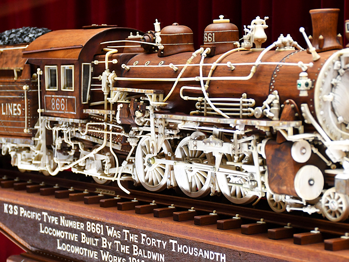 Holy smokestacks, Batman! This intricately carved locomotive puts even the most elaborate model train sets to shame. Choo-choo-choose to be amazed!
