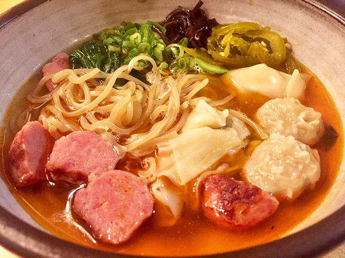 This isn't your college dorm ramen – tender noodles swim in a rich broth alongside perfectly pink meat and plump dumplings. Photo credit: ZenFoodster E.