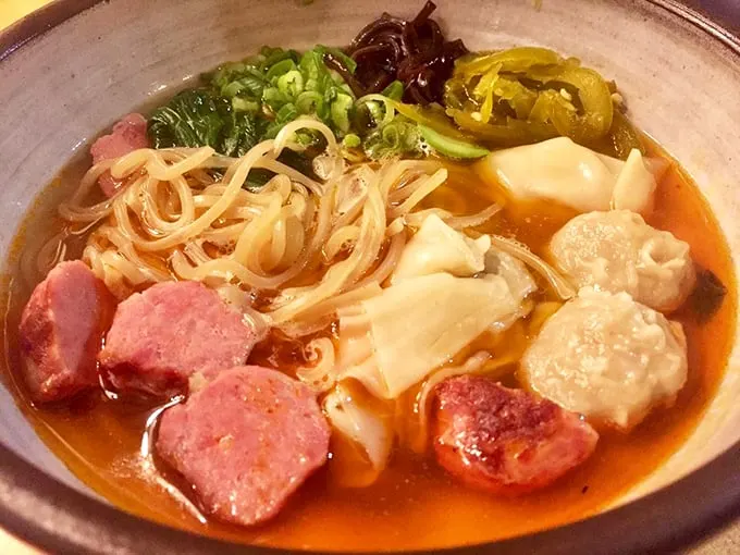 This isn't your college dorm ramen – tender noodles swim in a rich broth alongside perfectly pink meat and plump dumplings. Photo credit: ZenFoodster E.
