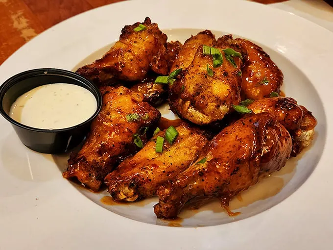 Wings so good, they'll make you do an Irish jig. Crispy, saucy, and begging to be devoured – pair with a pint for maximum enjoyment. Photo credit: Dawn Russell