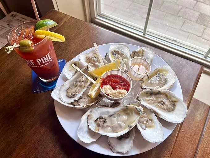 A match made in seafood heaven! Fresh oysters and a zesty cocktail – it's like Neptune and Bacchus threw a bash just for you.